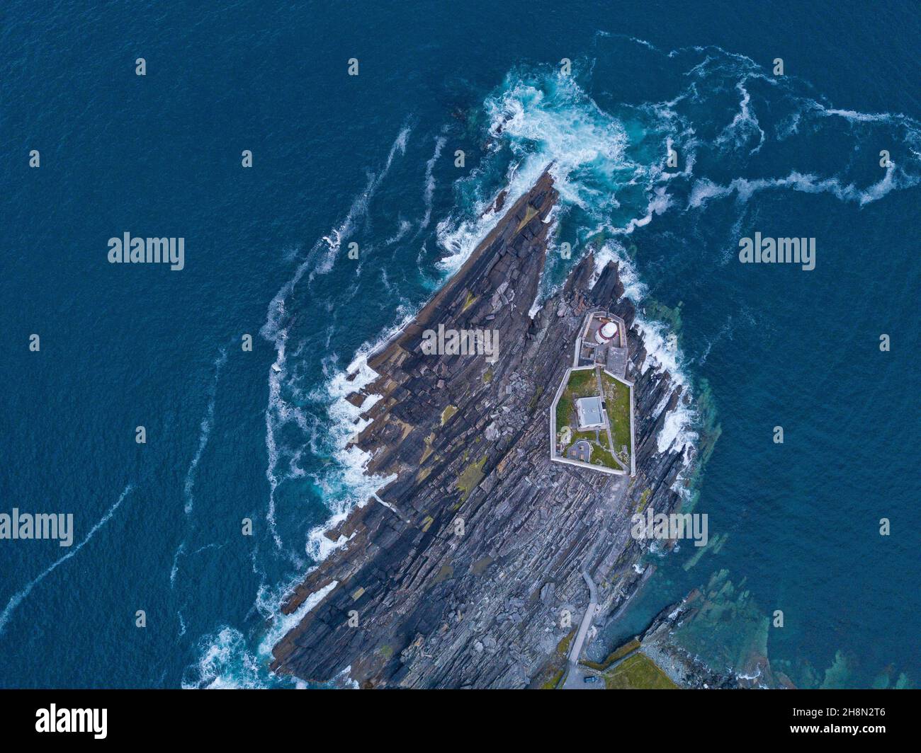 Aerial view, coast and cliffs with lighthouse, Valentia Island ...
