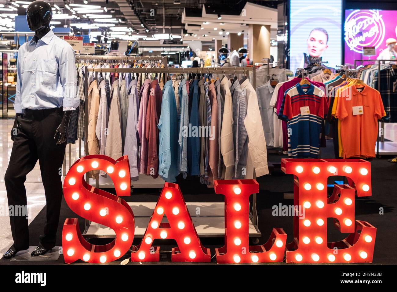 Sale clothes shop Stock Photo - Alamy