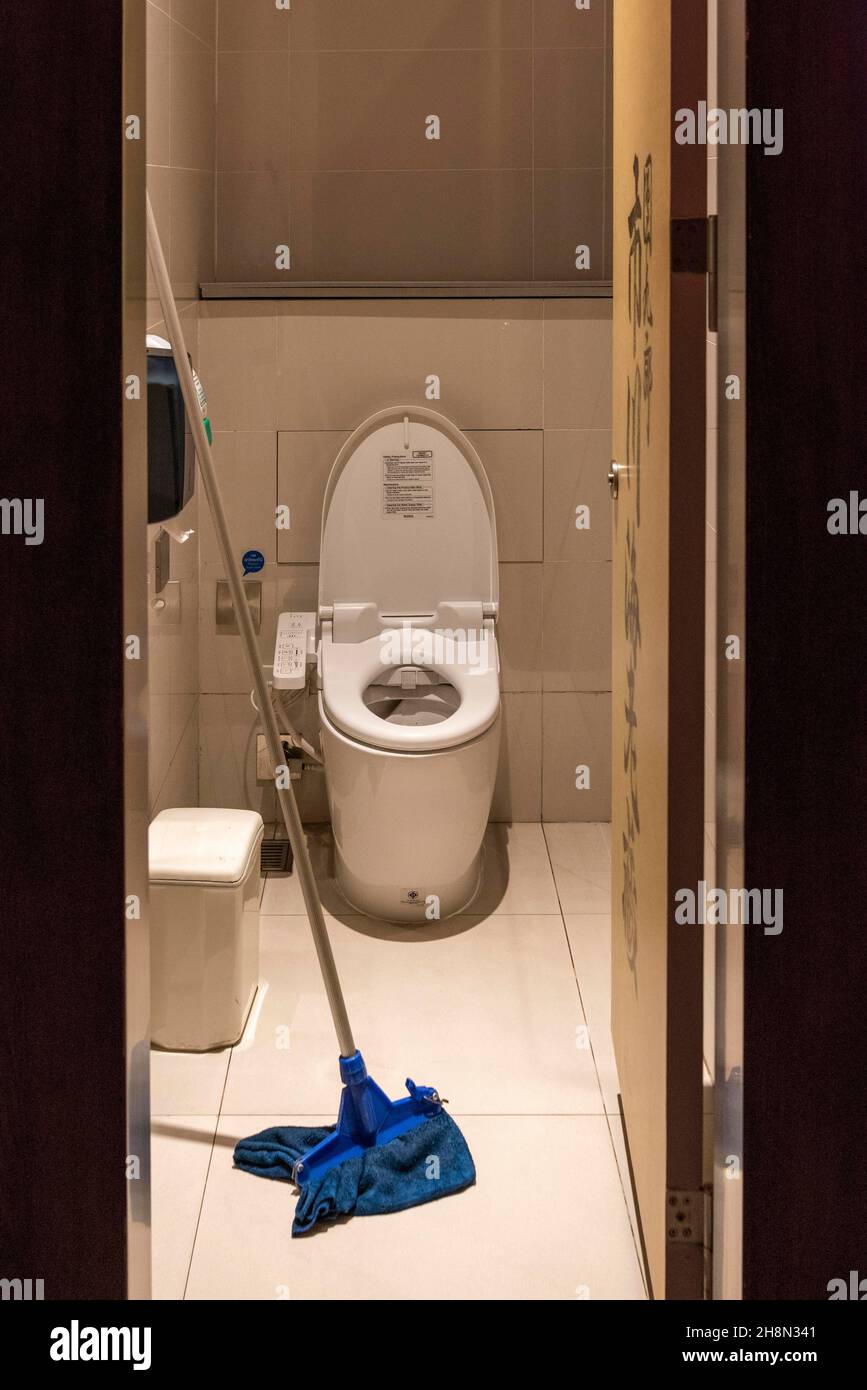 Floor mop and shower toilet Toilet Stock Photo - Alamy