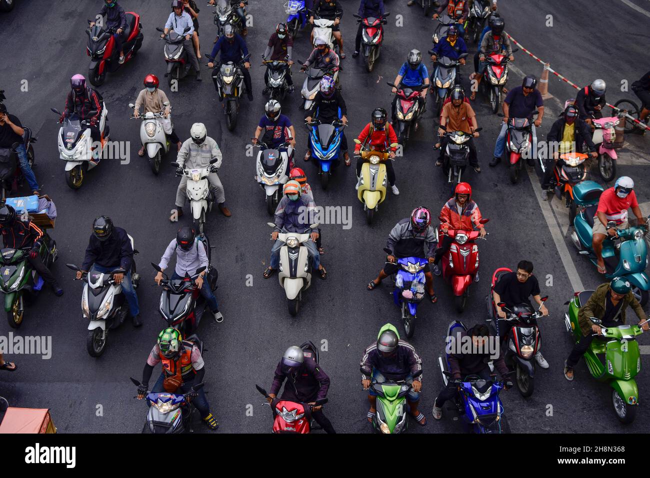 Bird's eye view of scooter riders, Bangkok, Thailand Stock Photo - Alamy