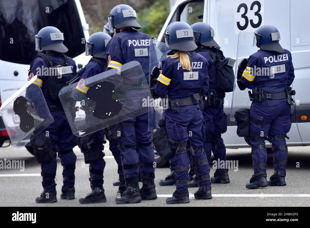 Police officers with protective equipment, Basel, Switzerland Stock ...