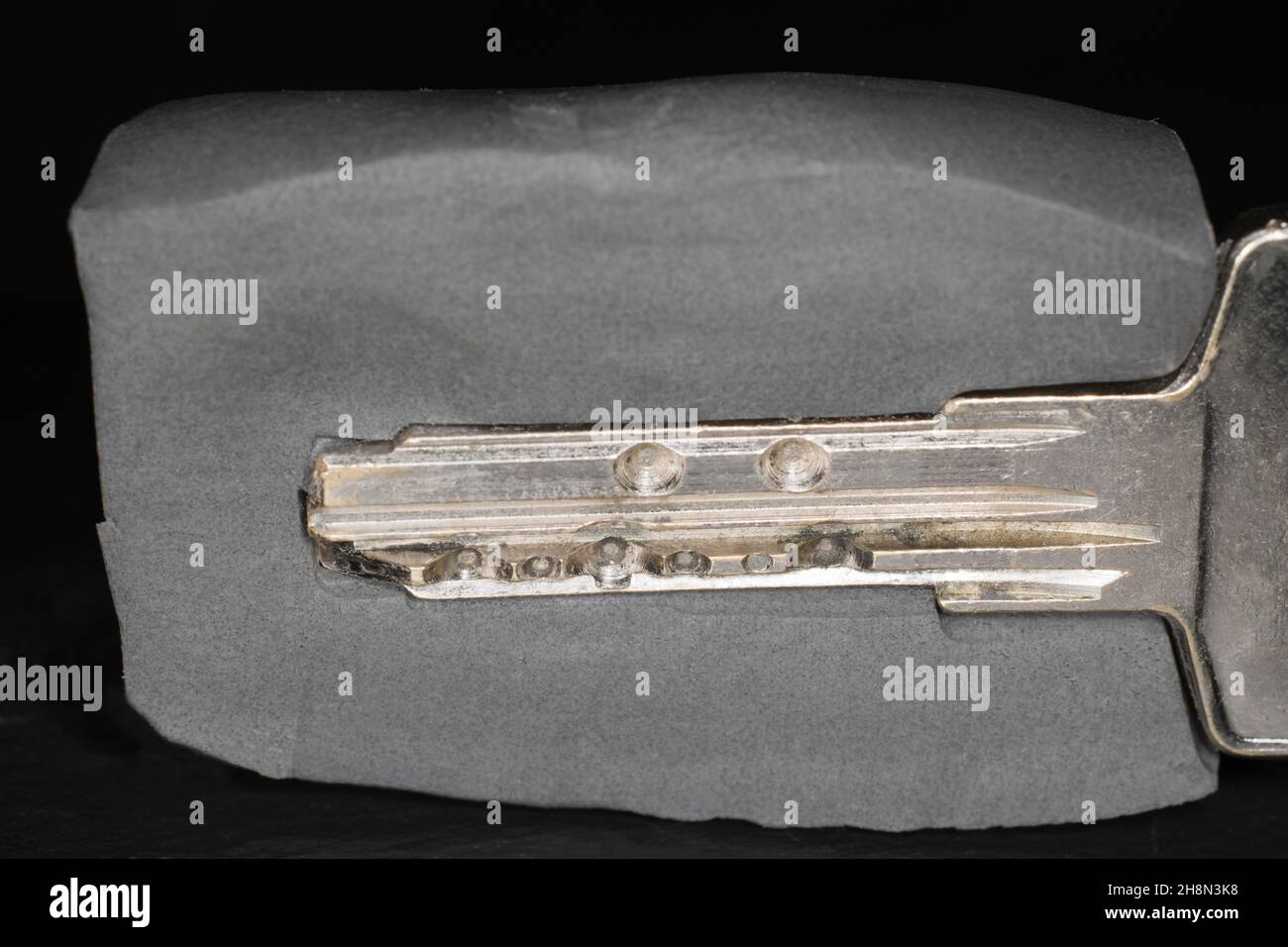 Copy key, by impression in a plasticine, studio photography with black ...