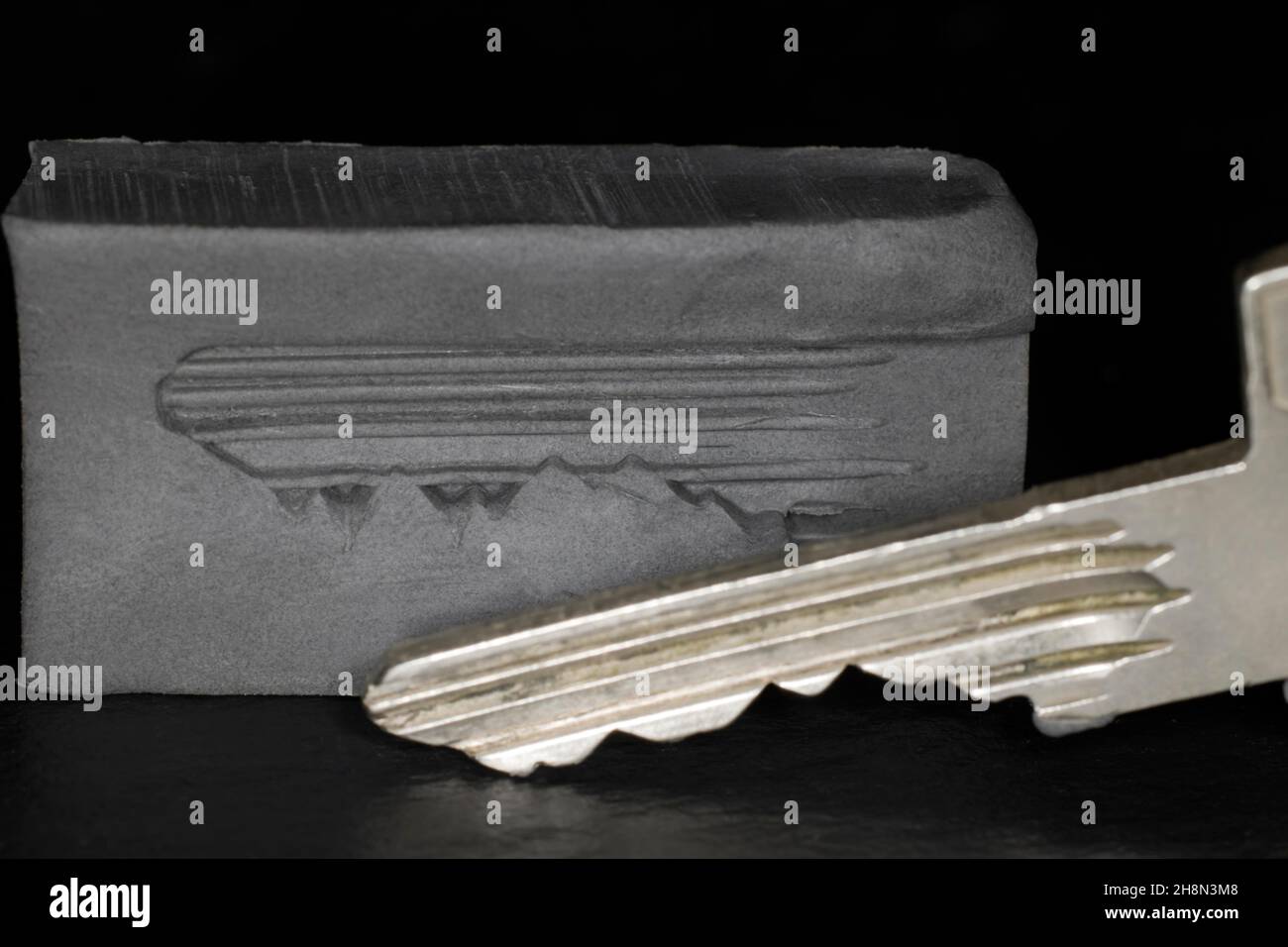 Copy key, by impression in a plasticine, studio photography with black ...