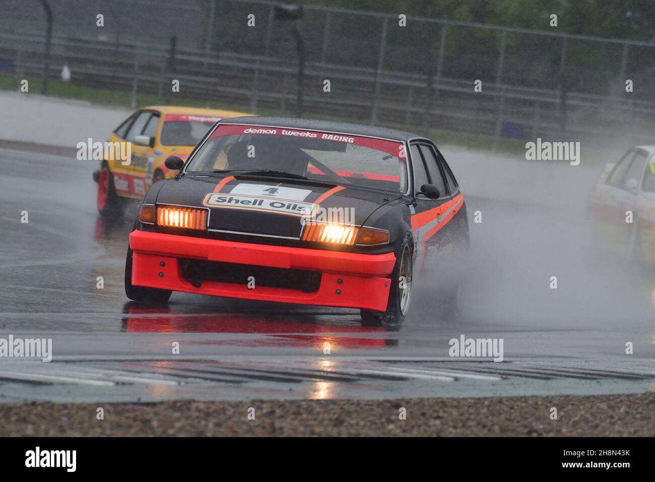 Pushing through heavy rain and spray, Chris Williams, Charles Williams ...
