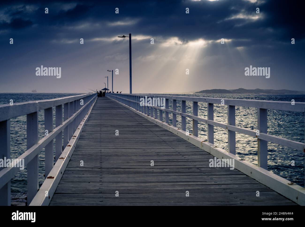 Beautiful view of a bridge over the water under a cloudy sky Stock ...