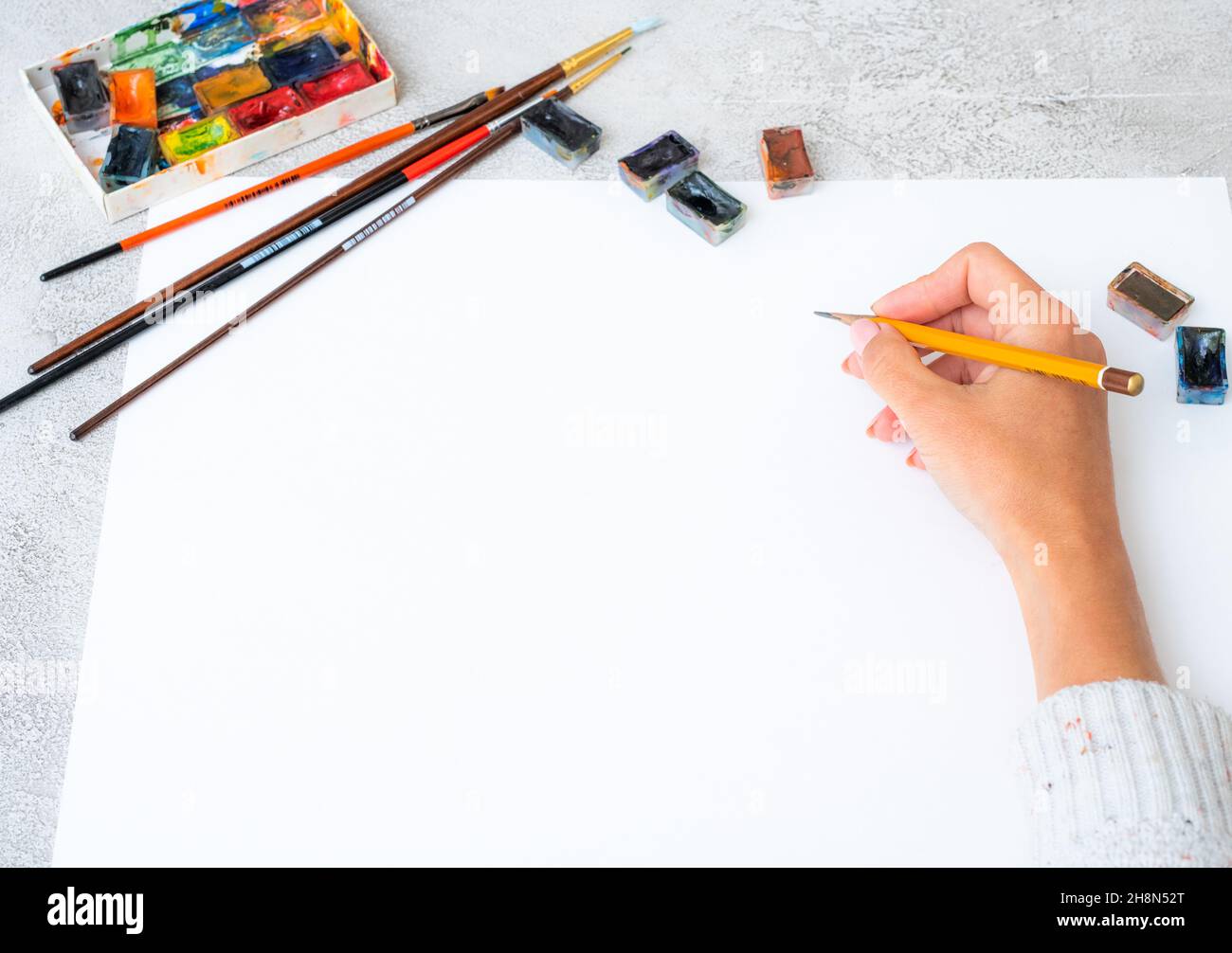 Top view of girl' hands drawing Stock Photo - Alamy
