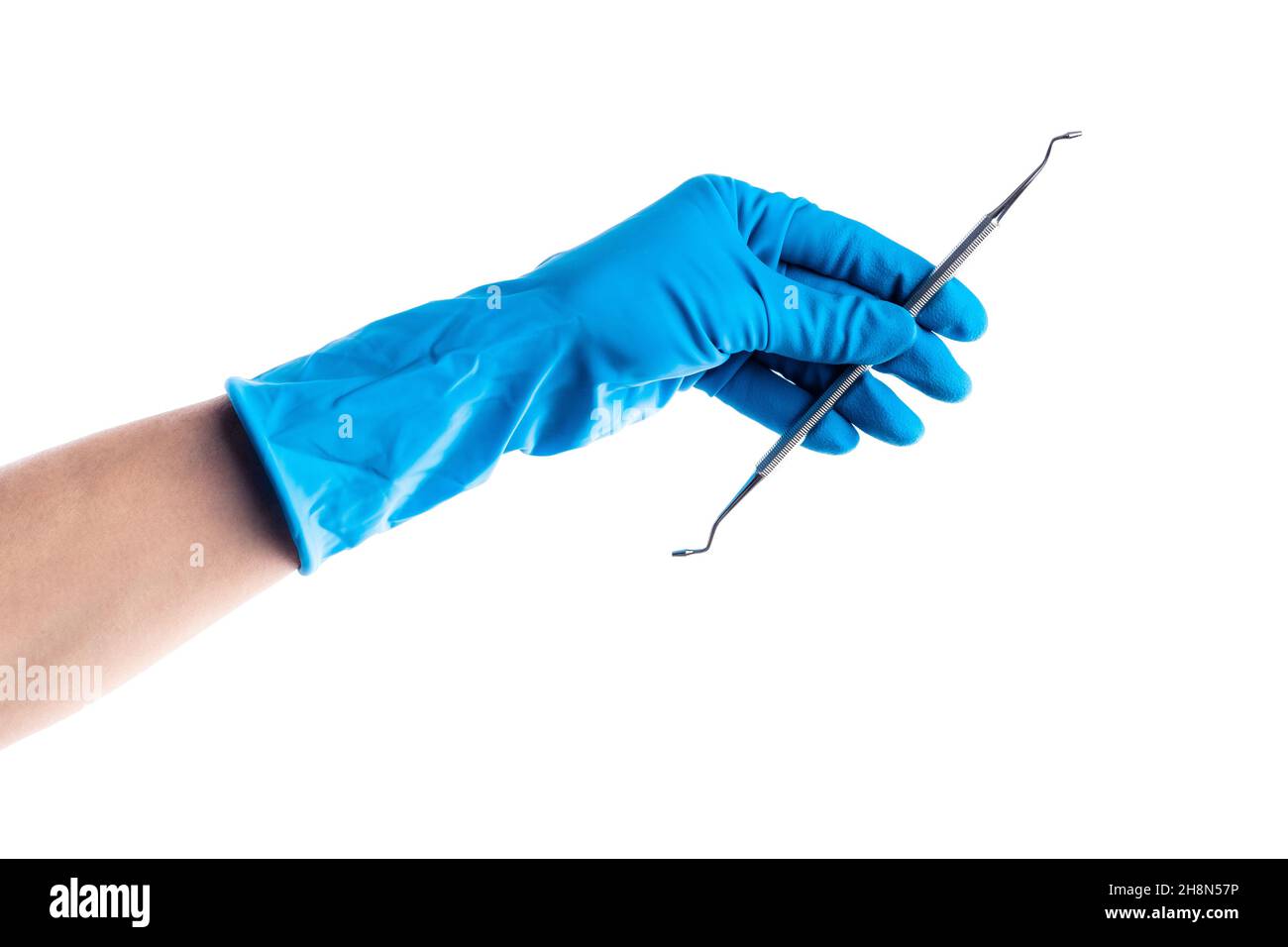 Hand in blue glove holding dental metal stick isolated Stock Photo - Alamy