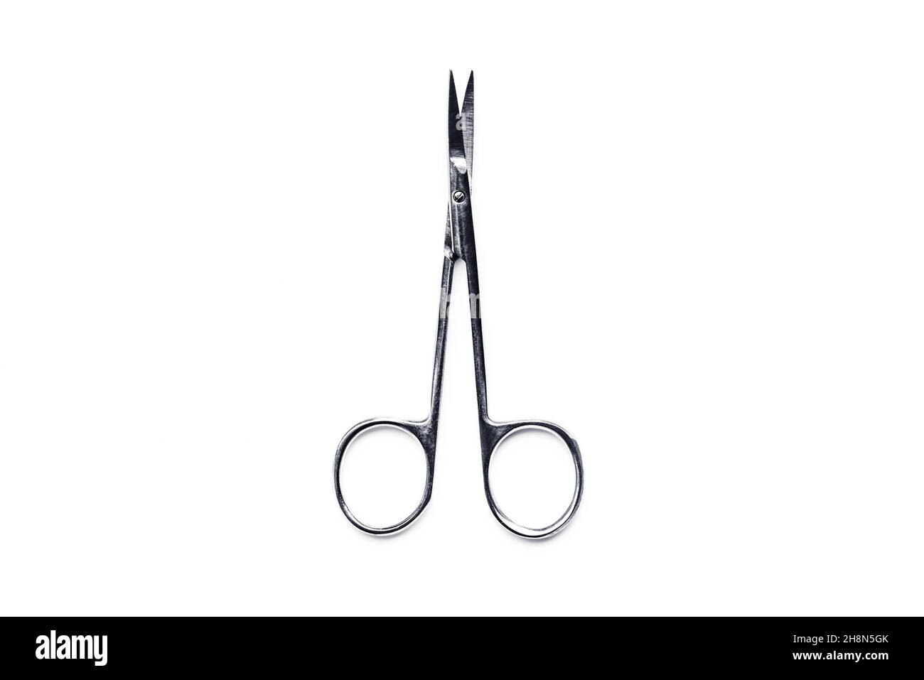 Metal medical scissors isolated Stock Photo - Alamy
