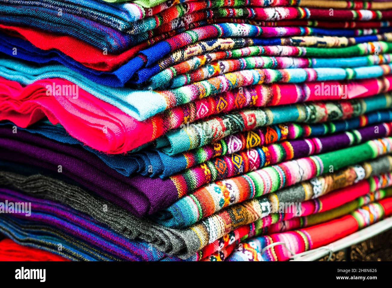 Stack of colorful blankets Stock Photo - Alamy