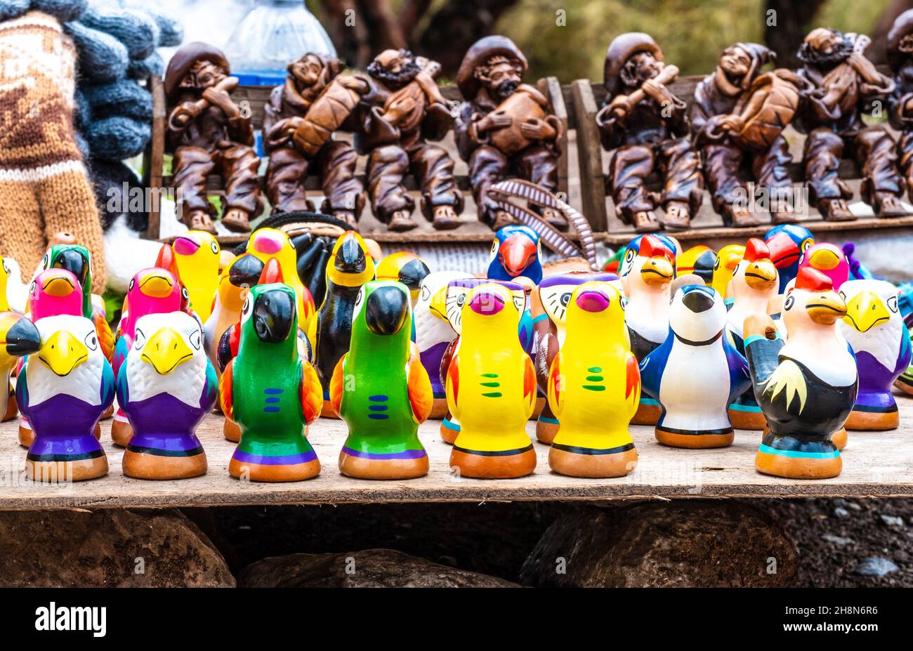Colorful bird whistles on the street shop in Peru Stock Photo - Alamy