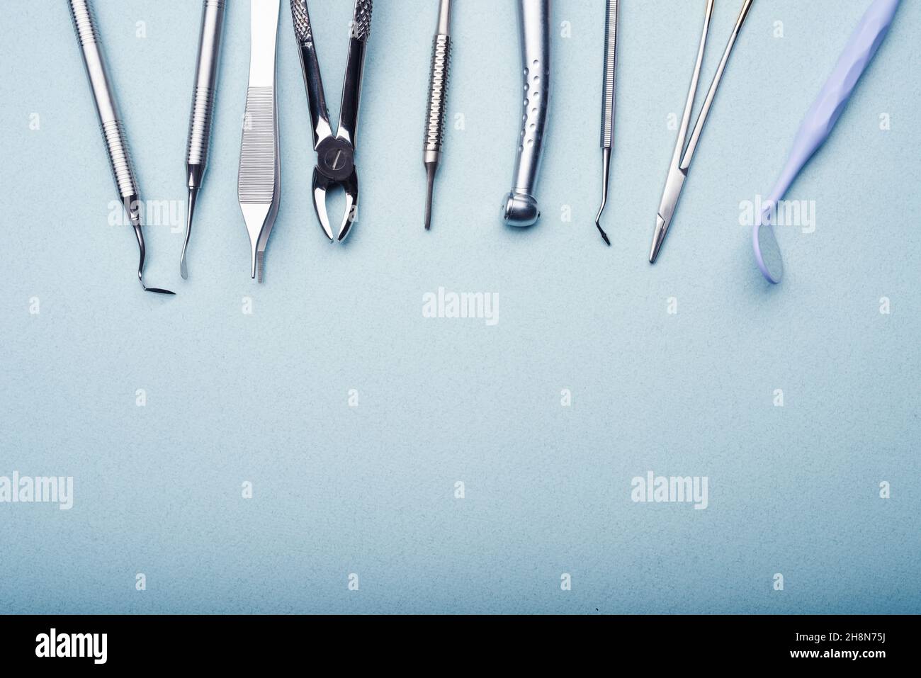 Dental steel instruments with copy space Stock Photo - Alamy