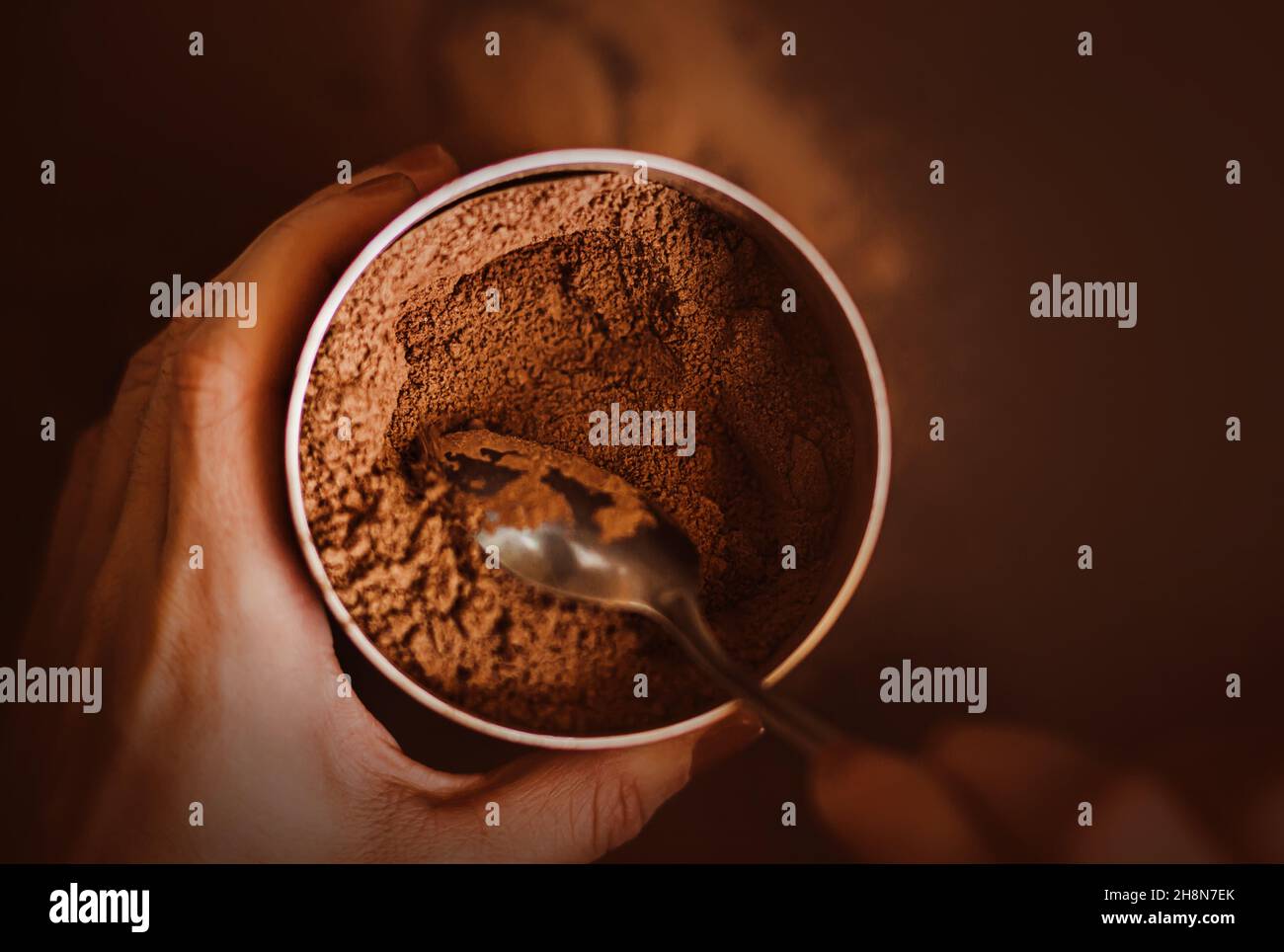 Woman mix cocoa powder hi-res stock photography and images - Alamy