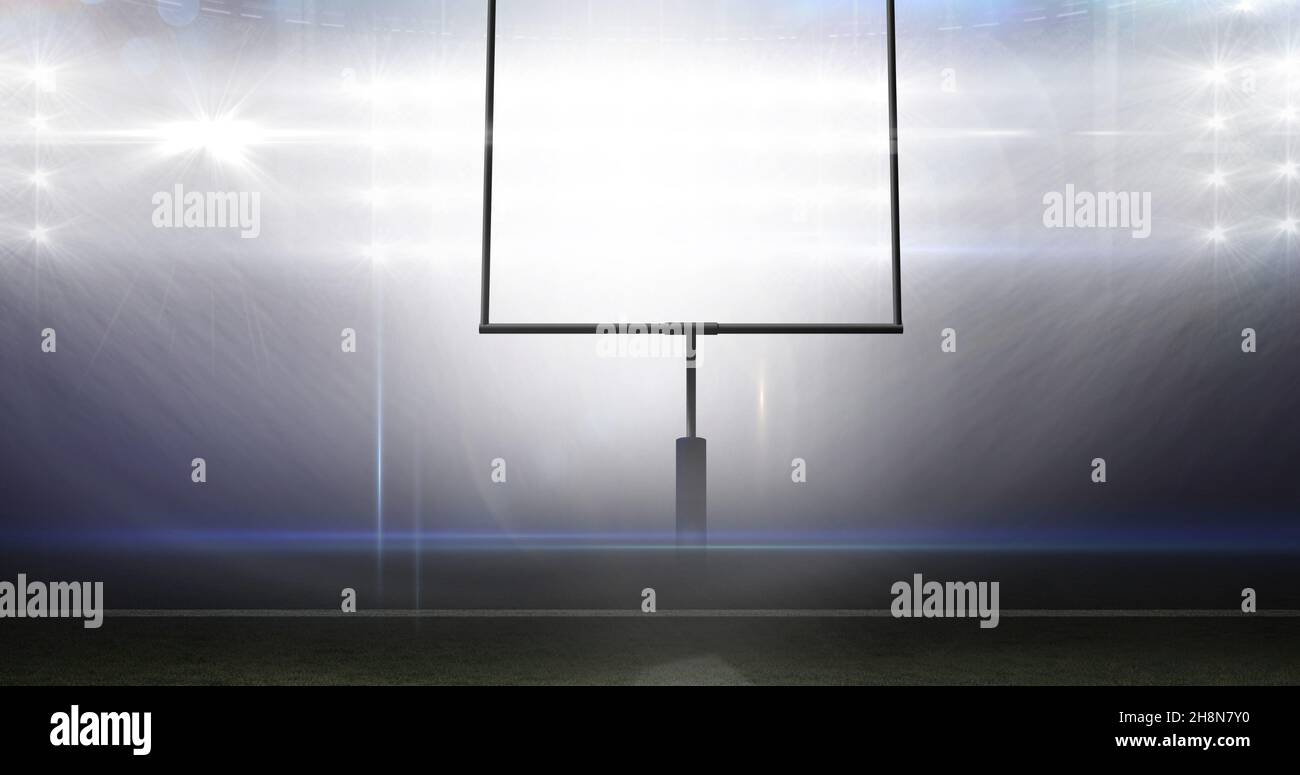Empty goal post against illuminated bright american football stadium at ...