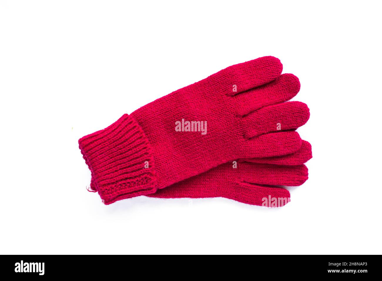 Red wool glove, top view of red glove isolated on white background ...