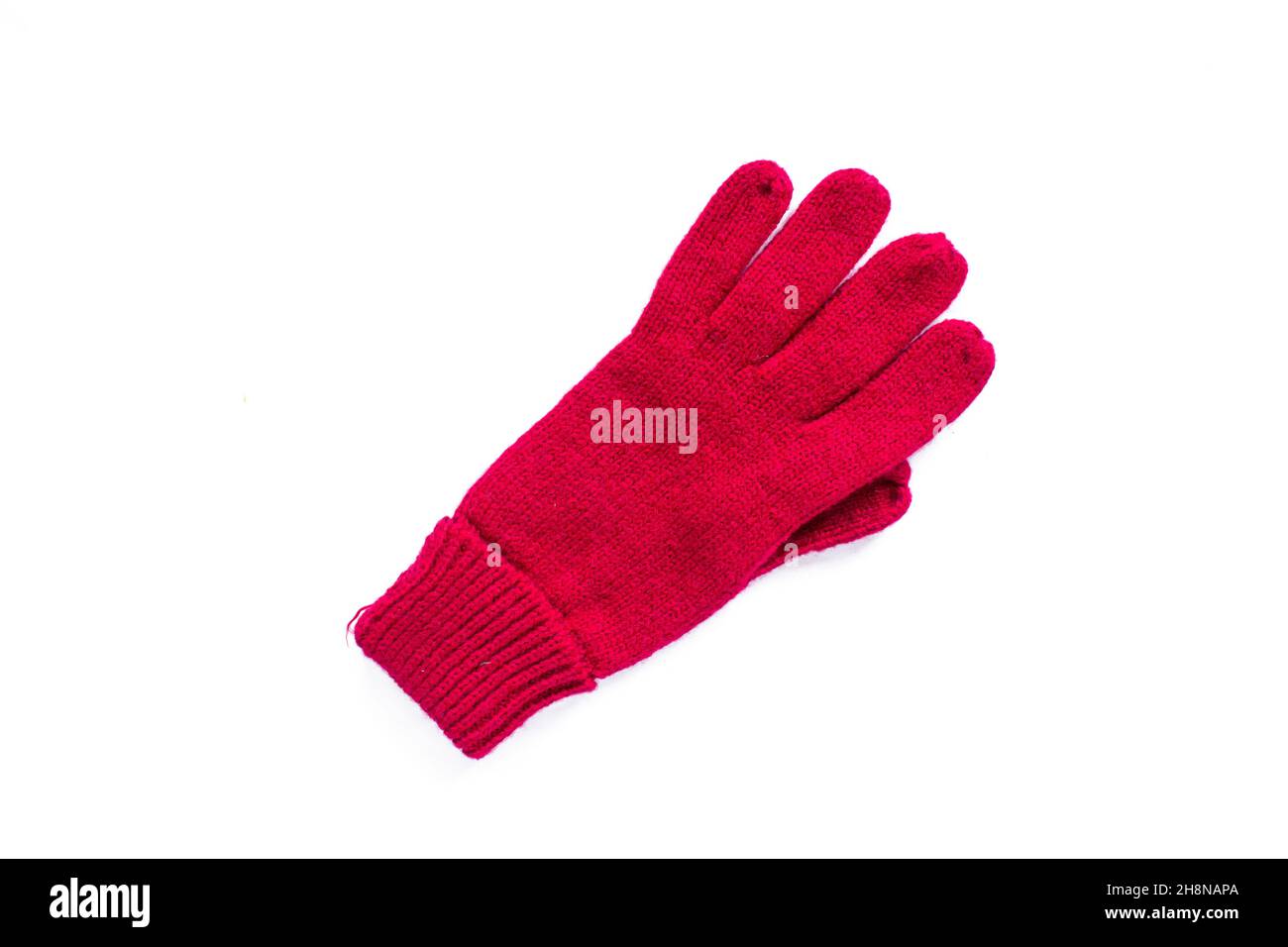 Red wool glove, top view of red glove isolated on white background ...