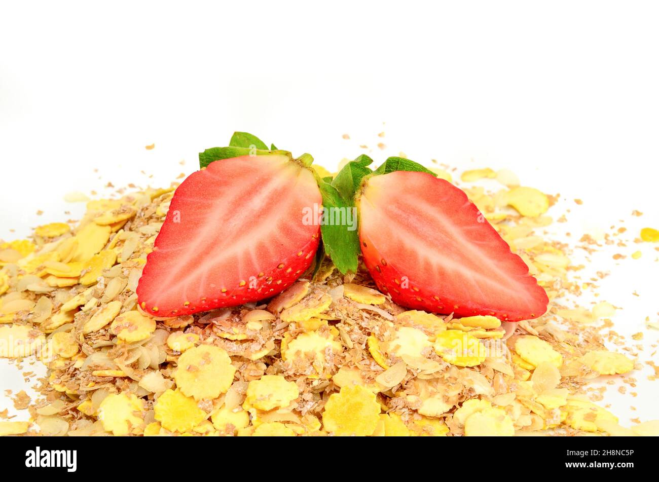 Fresh Strawberry flakes on a white background Stock Photo - Alamy