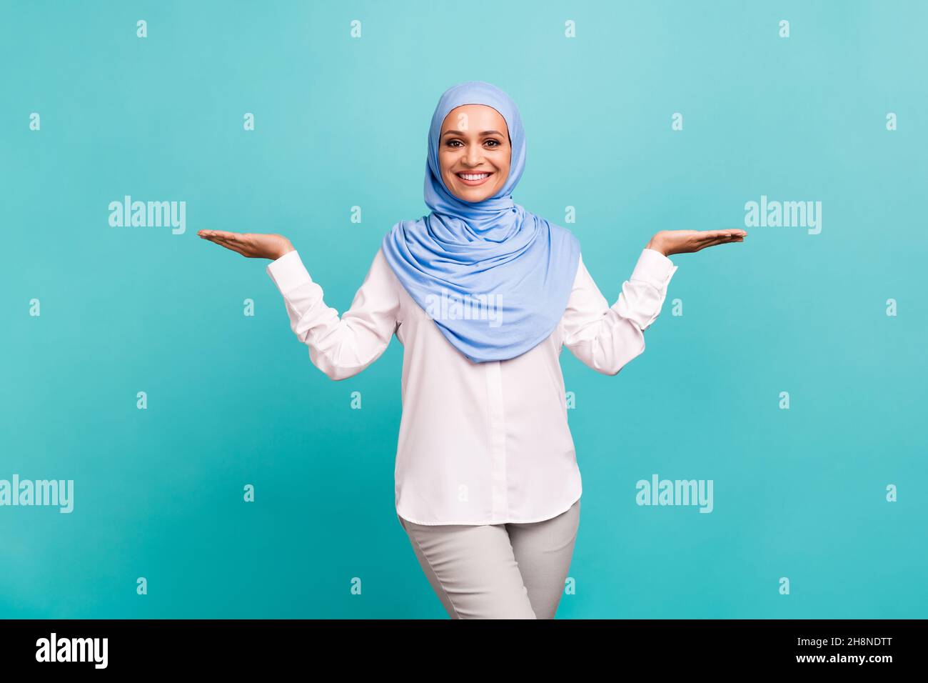 Photo of adorable pretty young lady dressed islamic hijab smiling ...