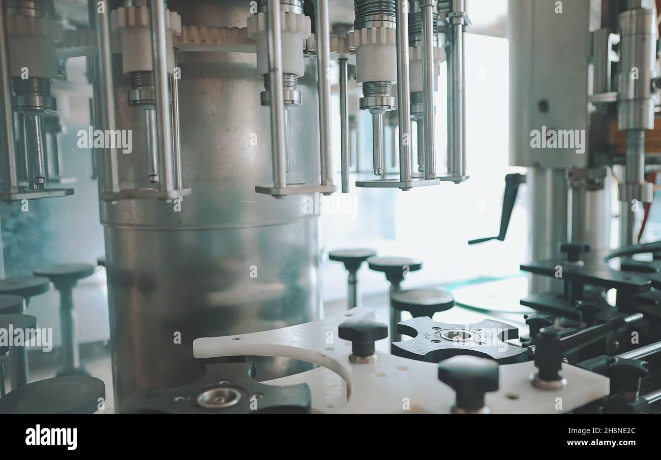 Automatic monoblock wine filling machine at wine factory Stock Photo ...