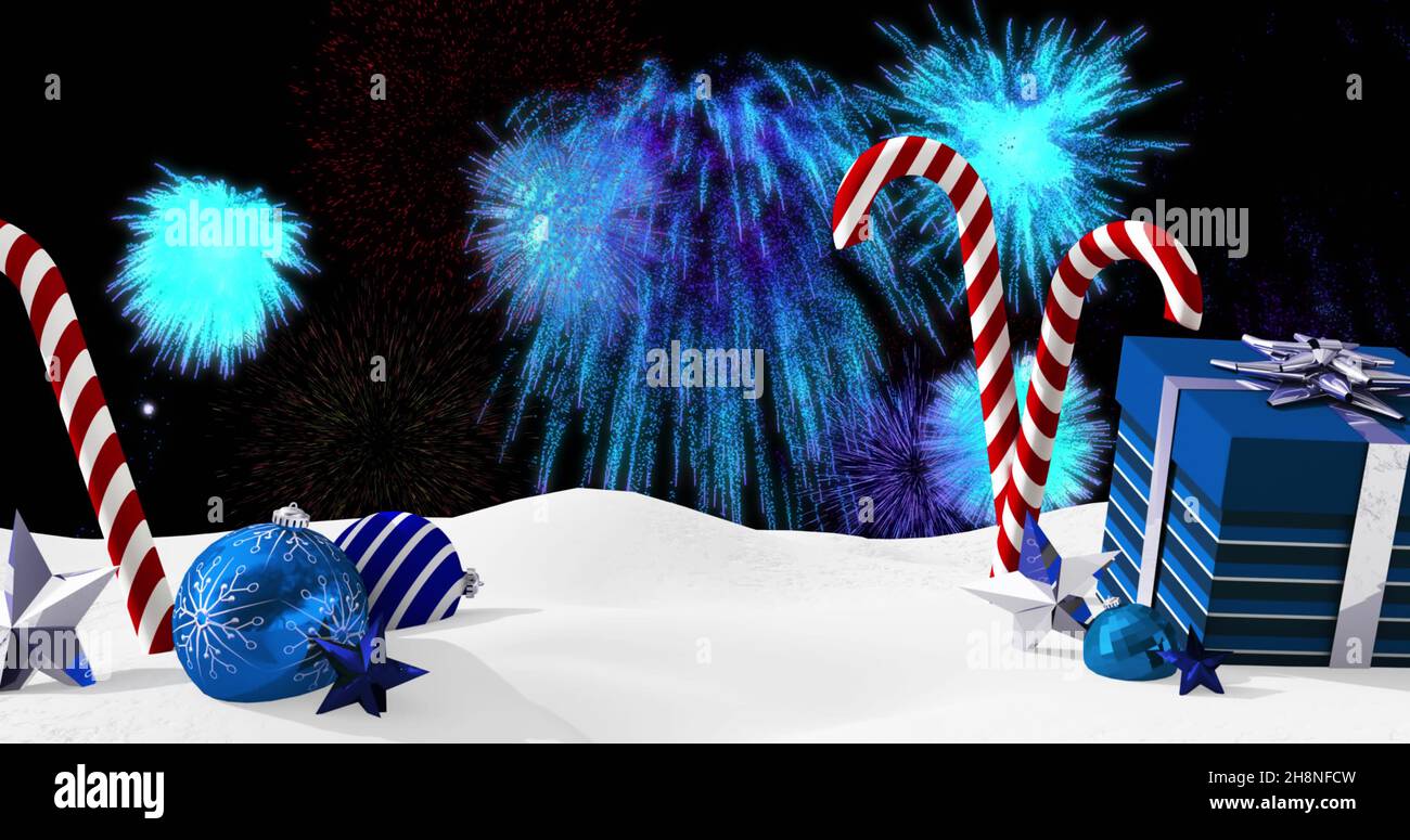 Image of christmas decorations and presents, with colourful fireworks ...