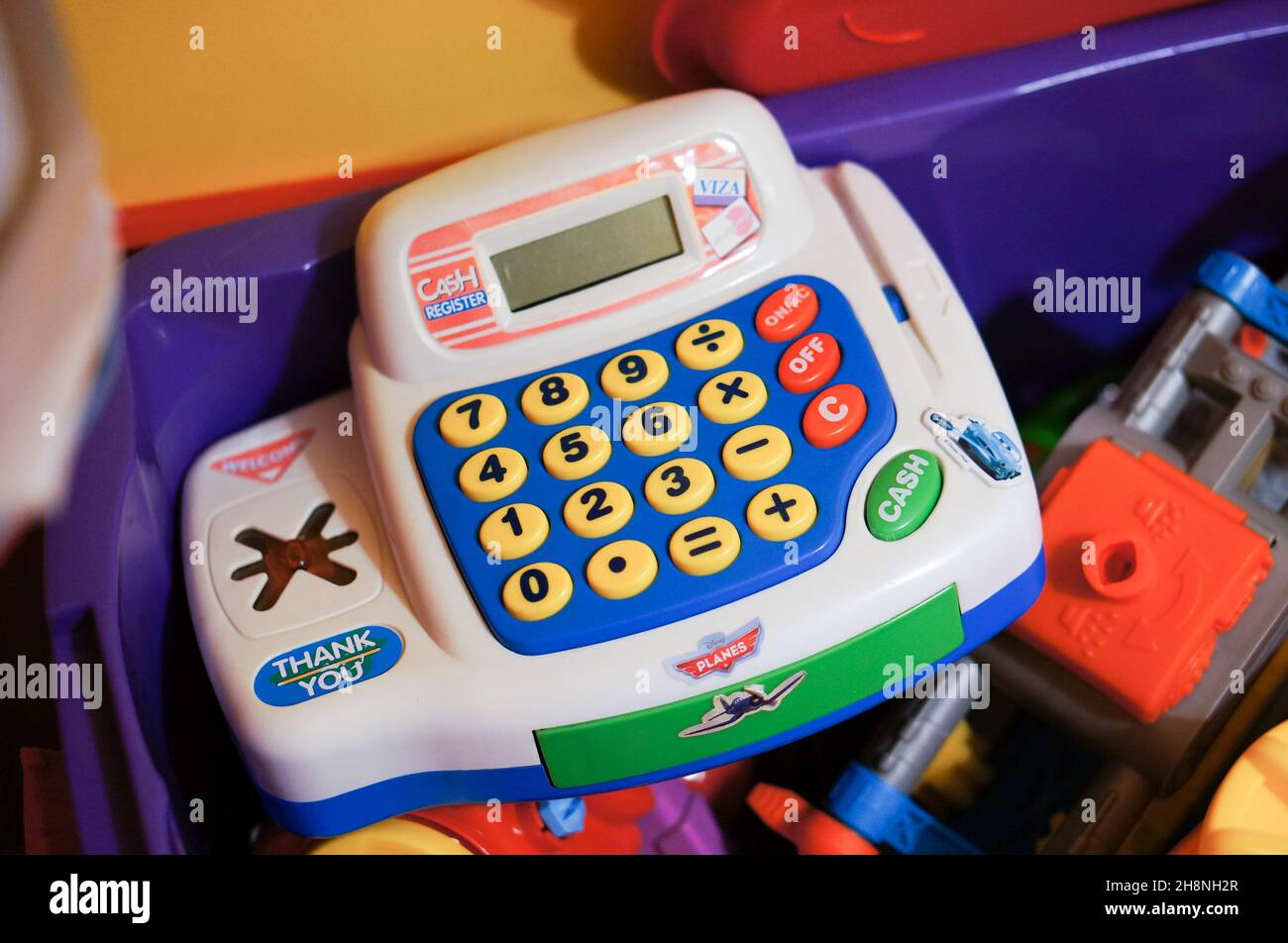 SIANOZETY, POLAND - Nov 11, 2015: A closeup of a plastic toy cash desk ...