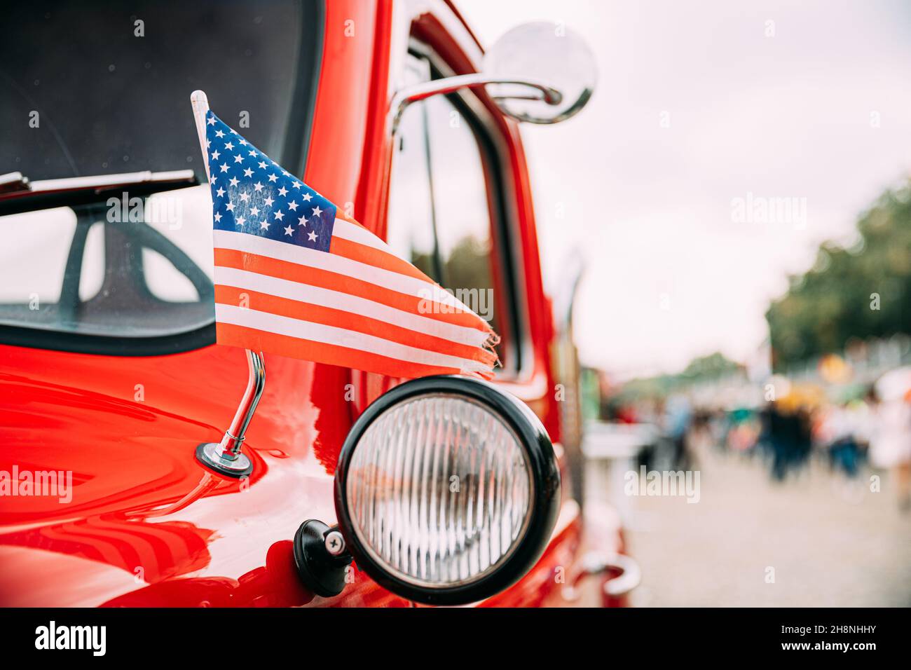 Red Pickup Truck With Small American Flag Waving. Close Side View Of ...