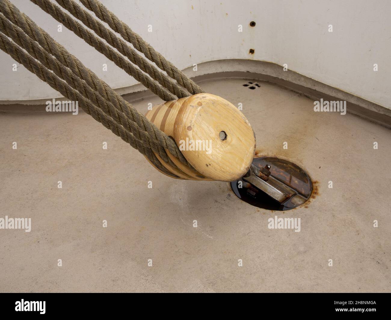 Ropes on the borders of the deck of an old ship Stock Photo - Alamy