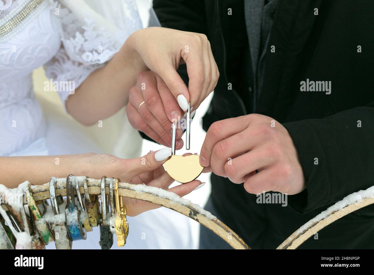 Love locks as a sign of the newlyweds' loyalty to each other concept of ...