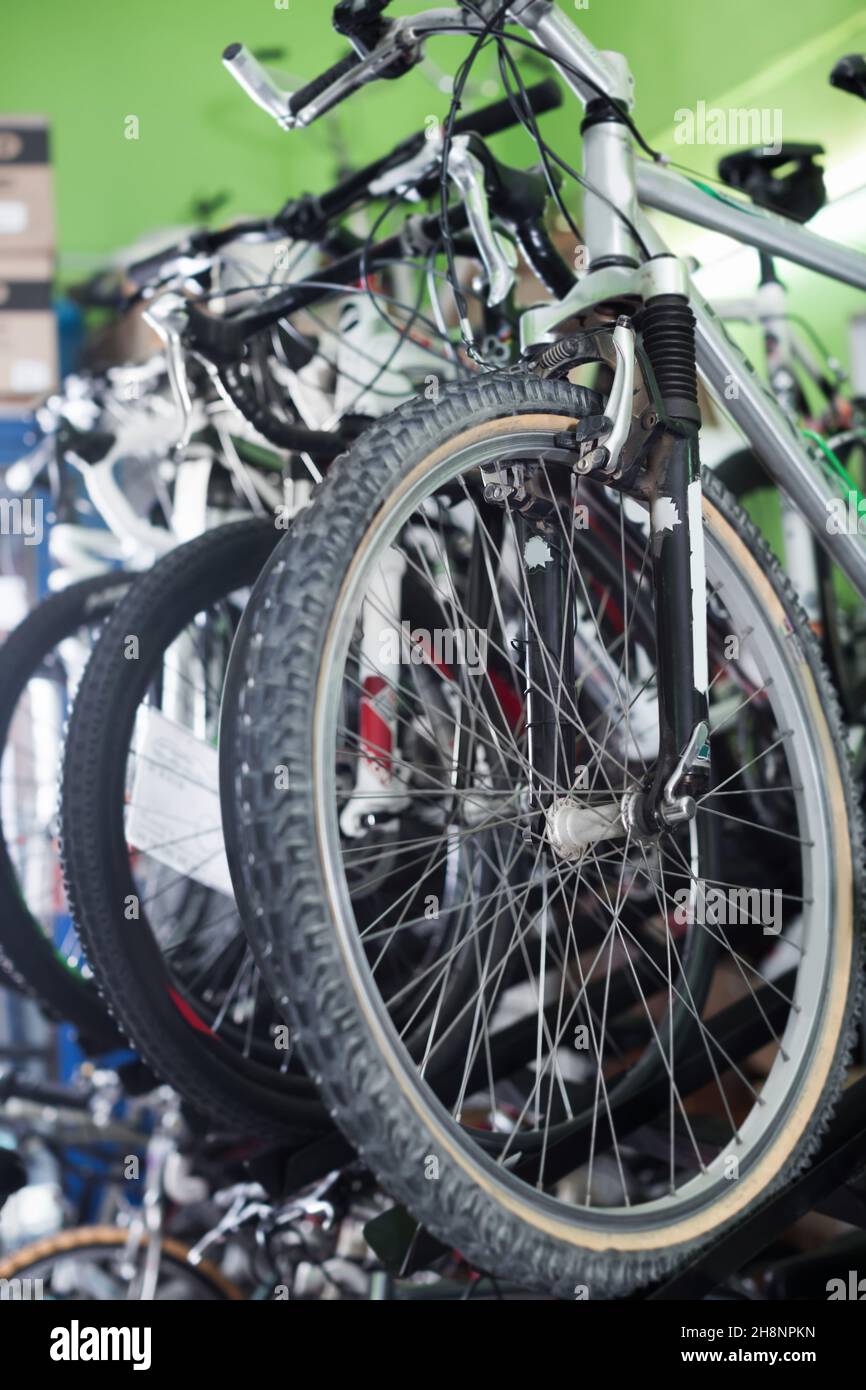 Image of different colors sport cycles selling Stock Photo - Alamy