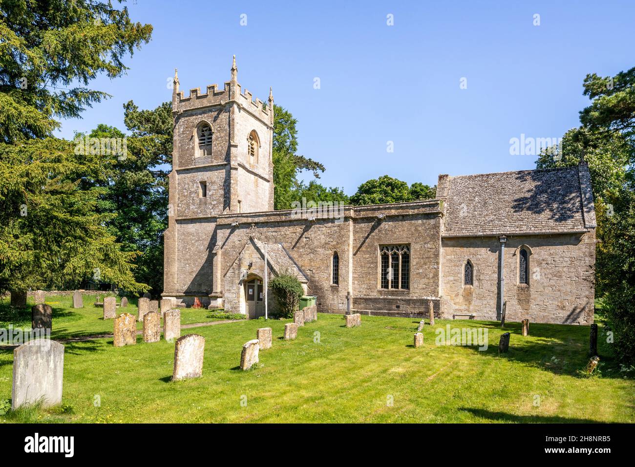 The 12th century Norman church of St Andrew in the Cotswold village of ...