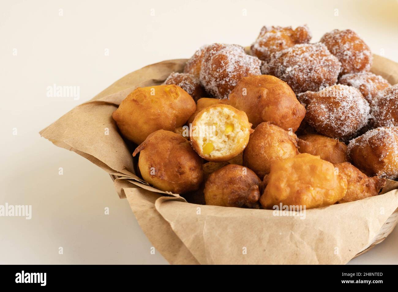 Corn Doughnut Balls served with tray Stock Photo - Alamy