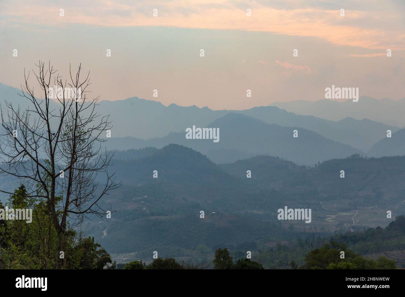 A view of the foothills of the Himalayas at sunset from the Newari ...