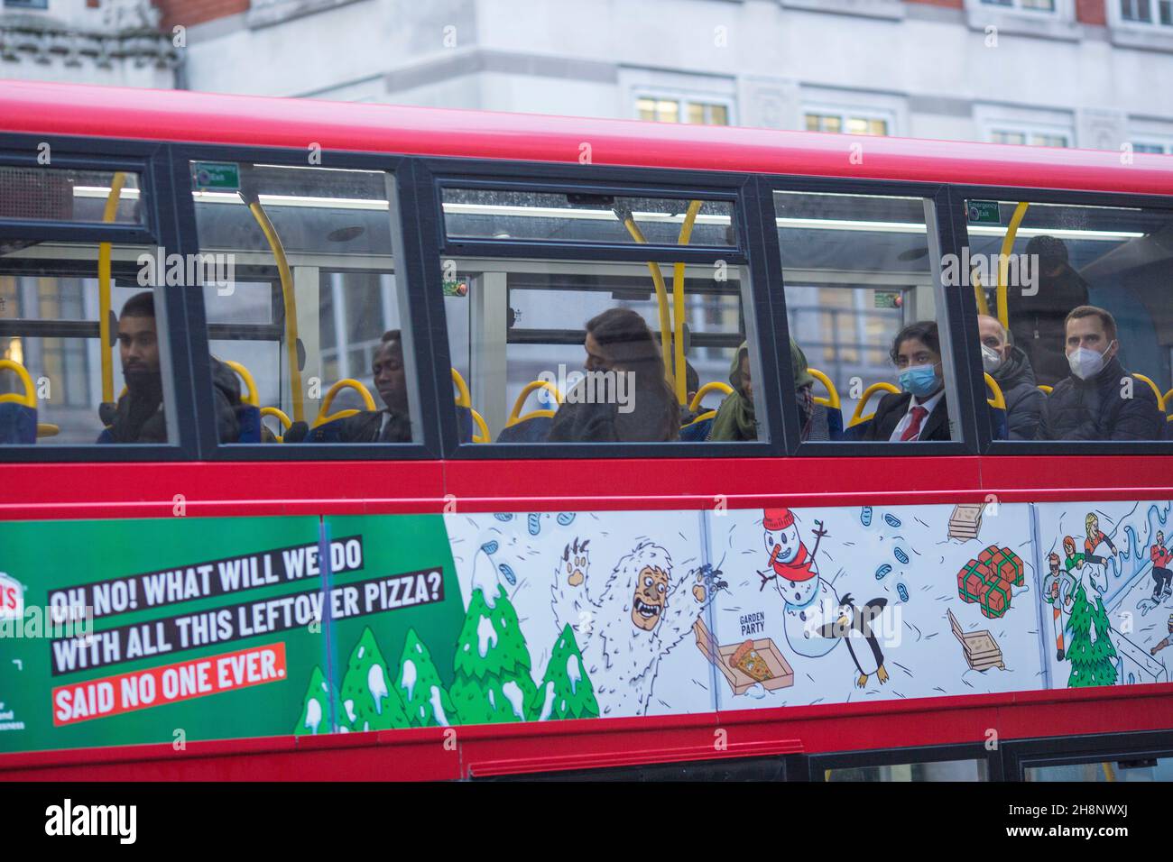 Some commuters are seen wearing their mask on public transport in ...