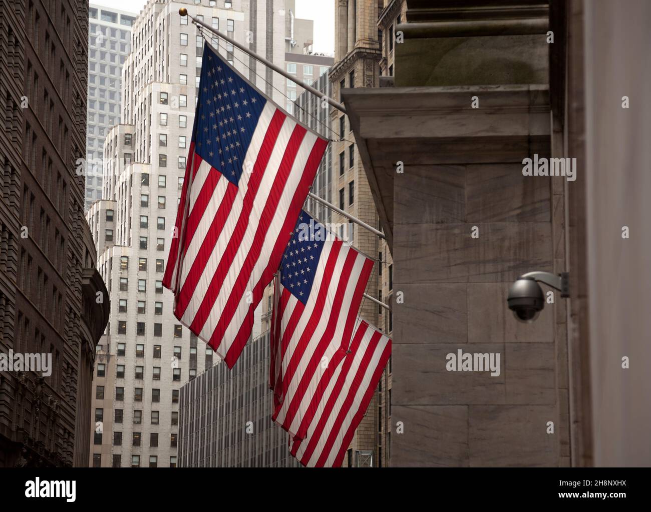 Use flag near an security camera in a facade of Manhattan Stock Photo ...