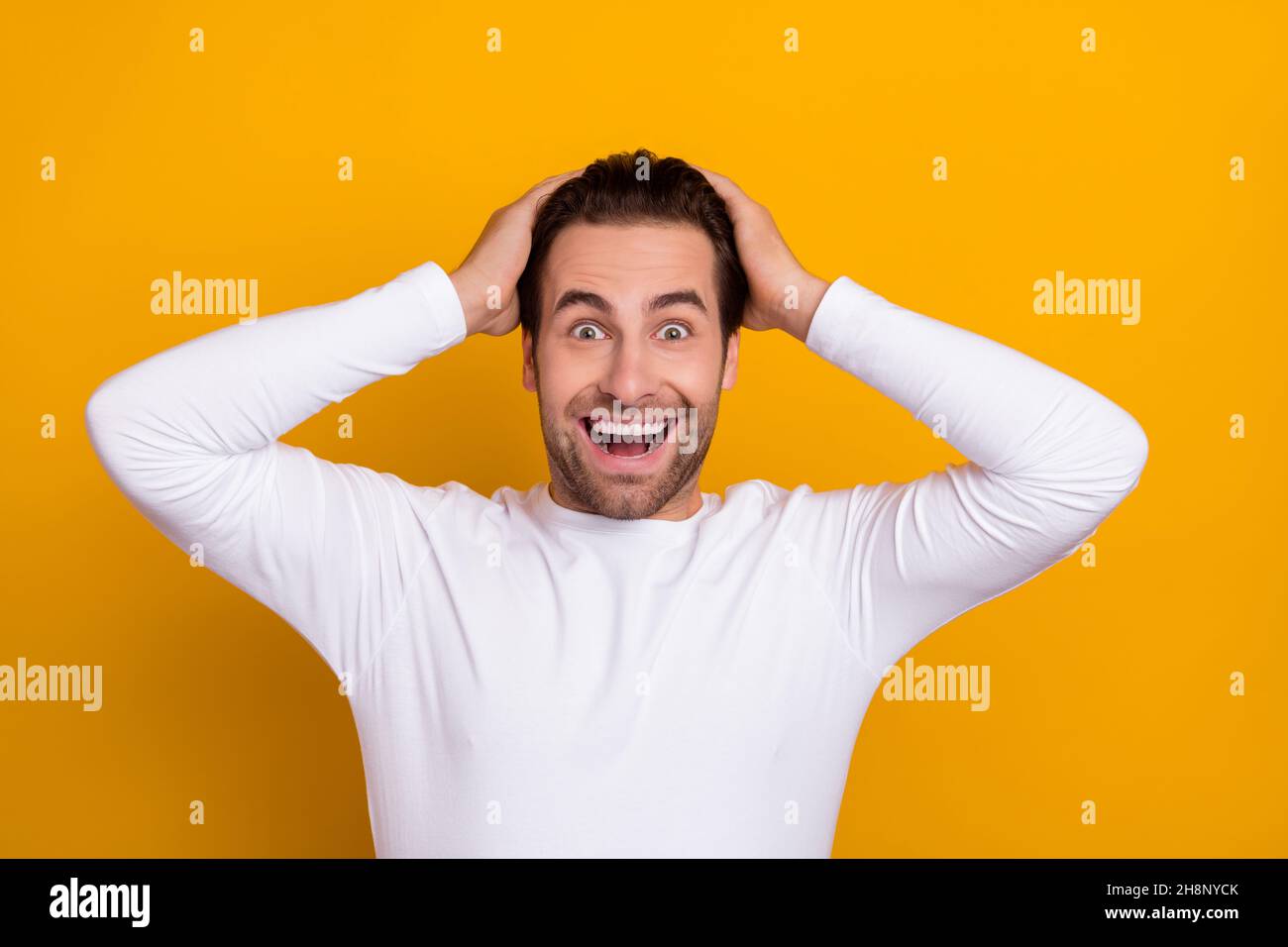 Portrait of impressed satisfied person hands on head open mouth cant ...