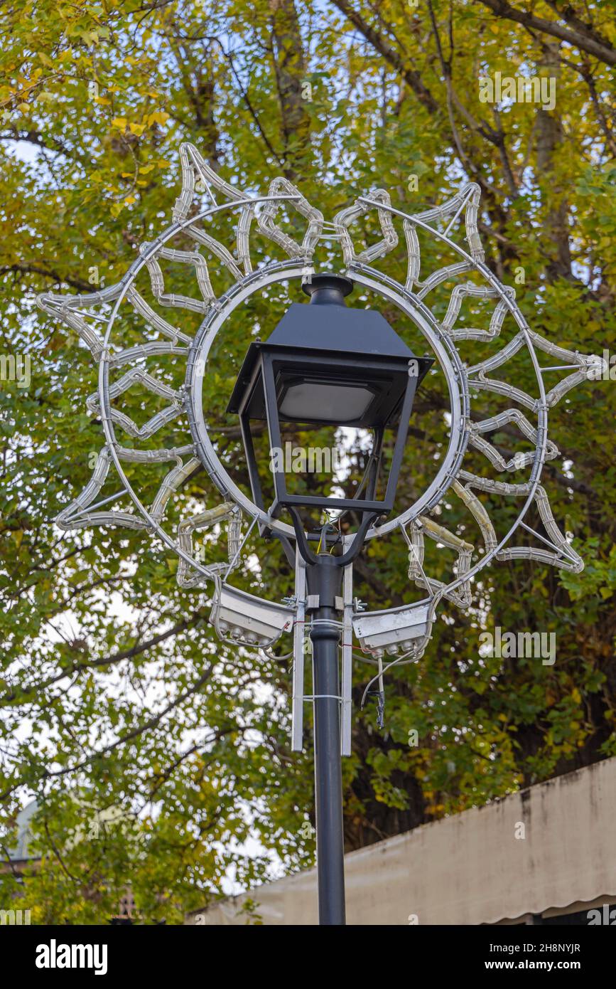 Christmas Decor Mounted at Street Lamp Pole Stock Photo - Alamy