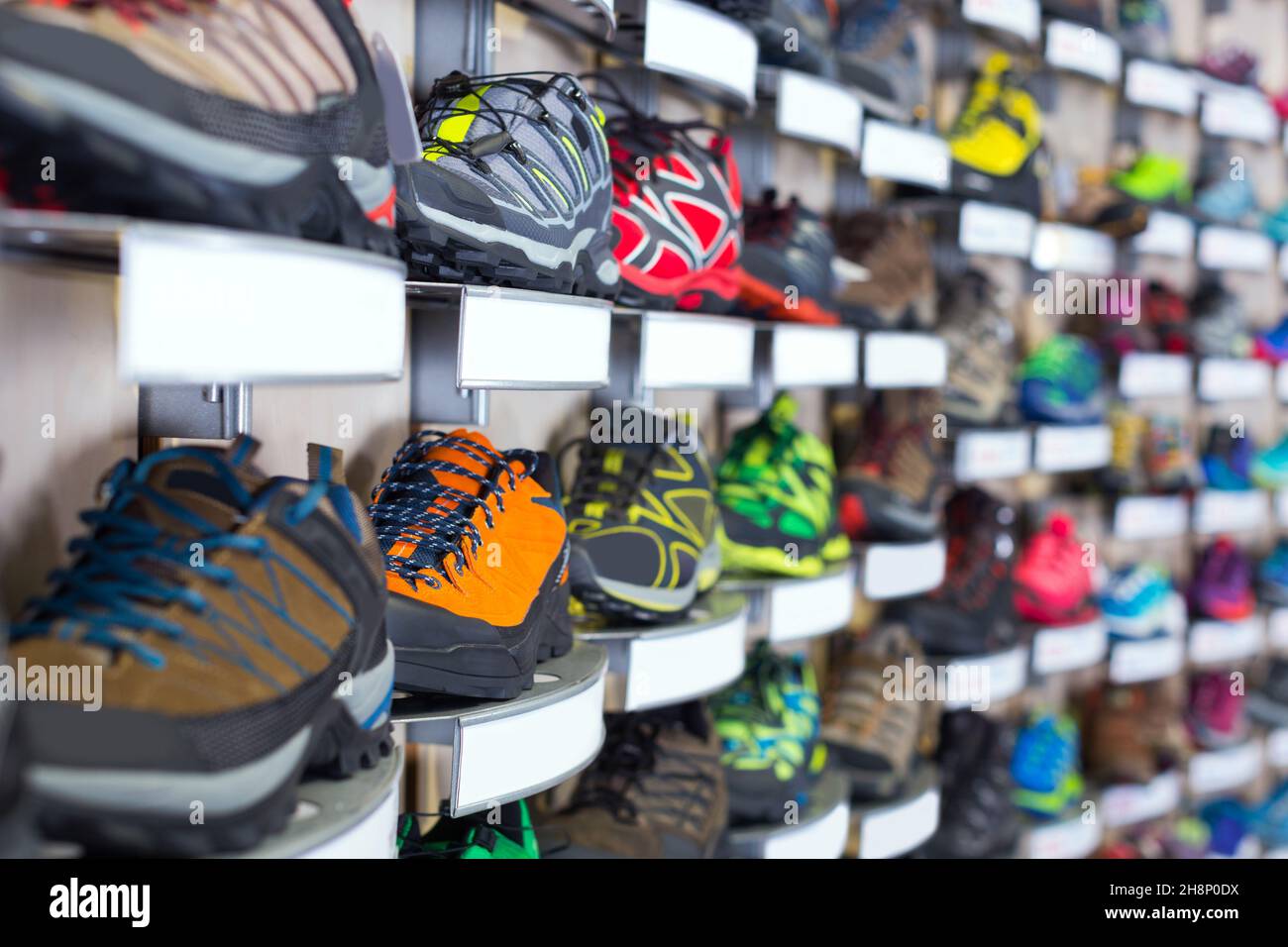 Image of sneakers on shelves Stock Photo - Alamy