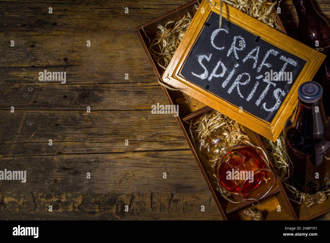 Craft spirit alcohol. Various bottles and glass with hand crafted hard ...