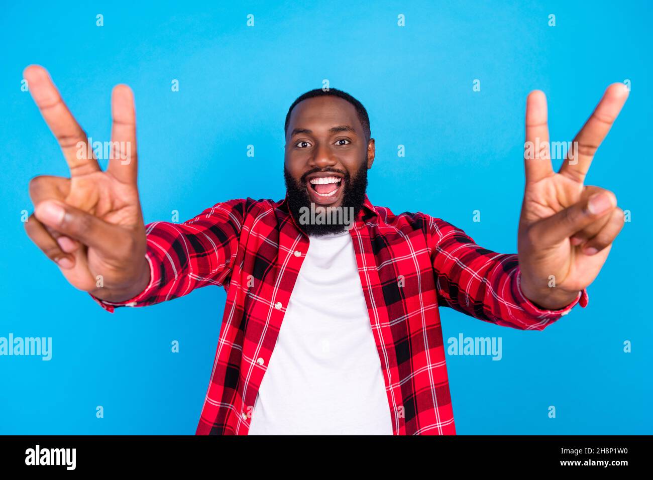 Photo Of Young Happy Positive Man Show Hands V Sign Good Mood Isolated