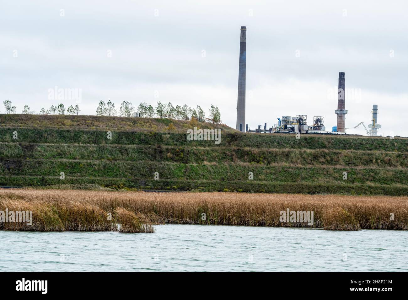 Re-greened tailings terraces and remediation pond at Glencore, Greater ...