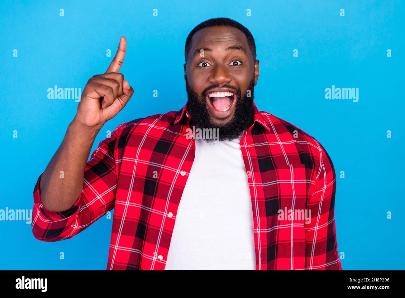 Photo of shocked happy excited young man point finger up idea plan ...