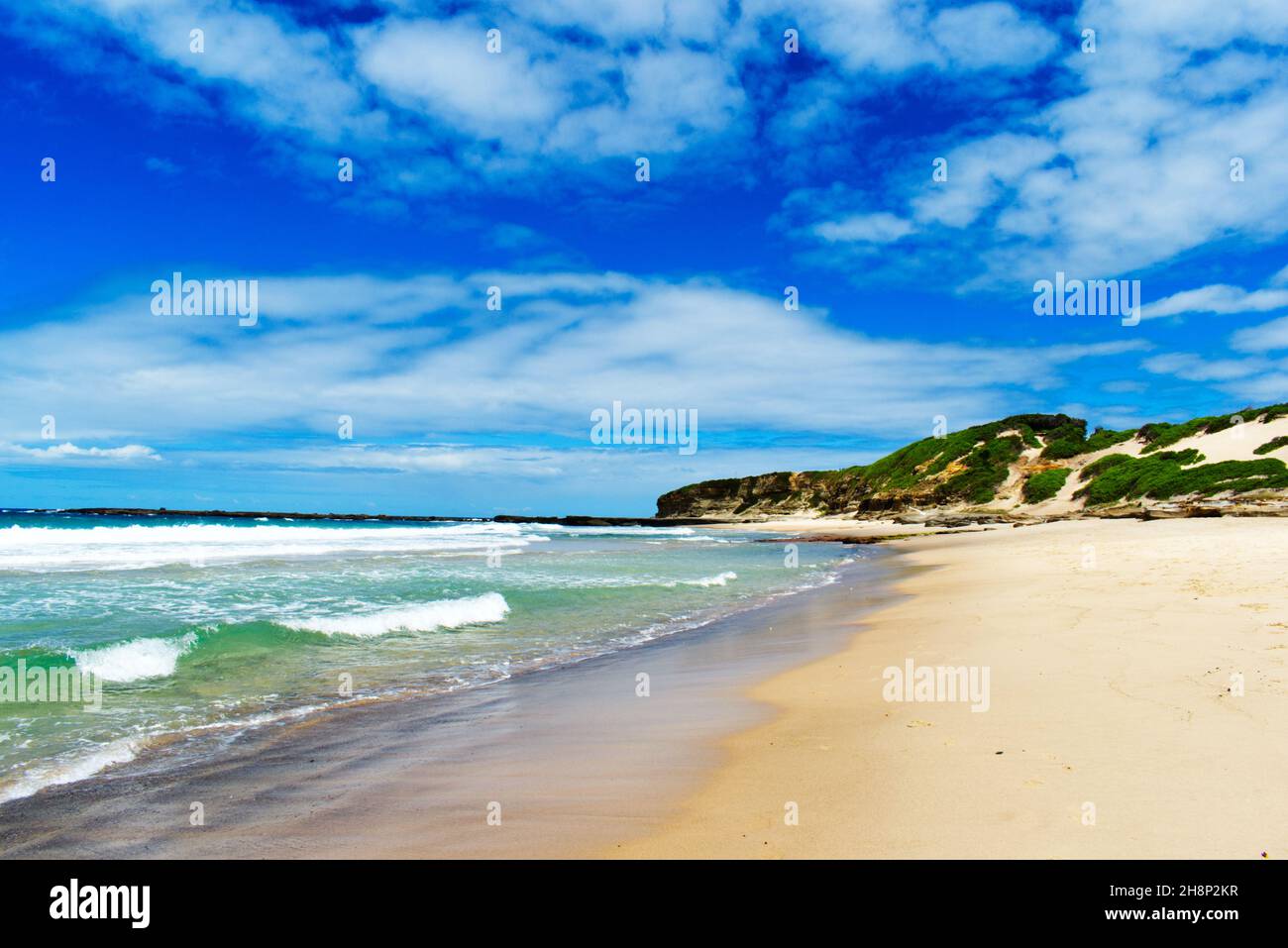 Empty white sand beach on an island Stock Photo - Alamy