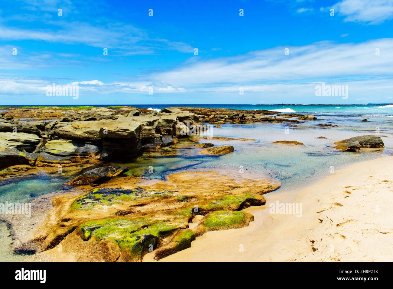 Empty white sand beach on an island Stock Photo - Alamy