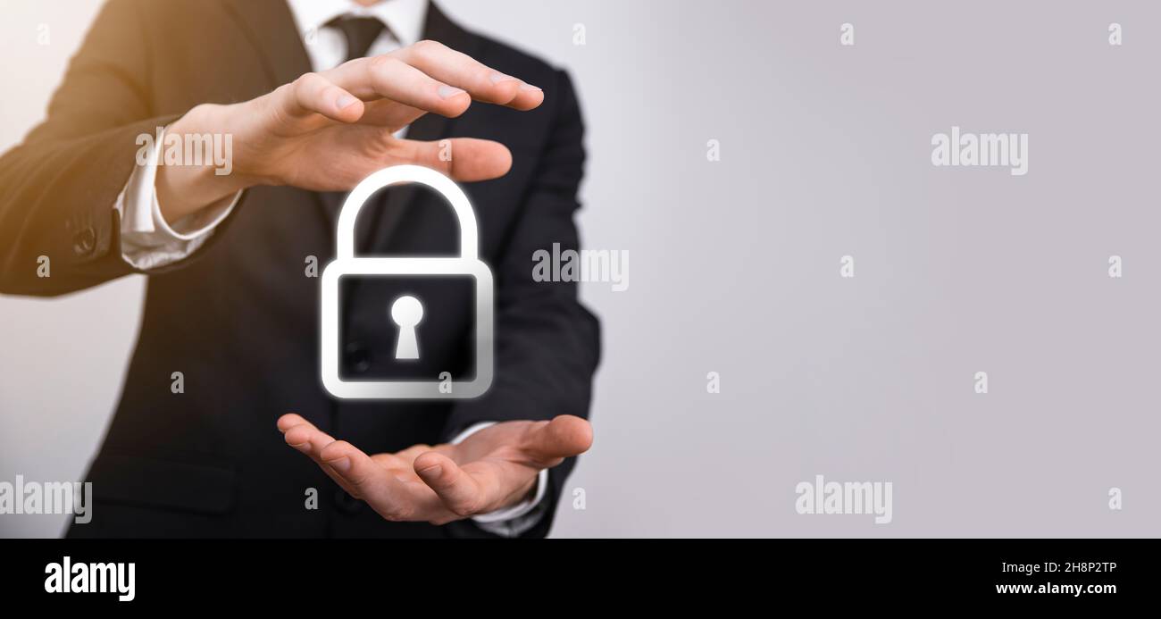 Male hand holding a lock padlock icon.Cyber security network. Internet ...