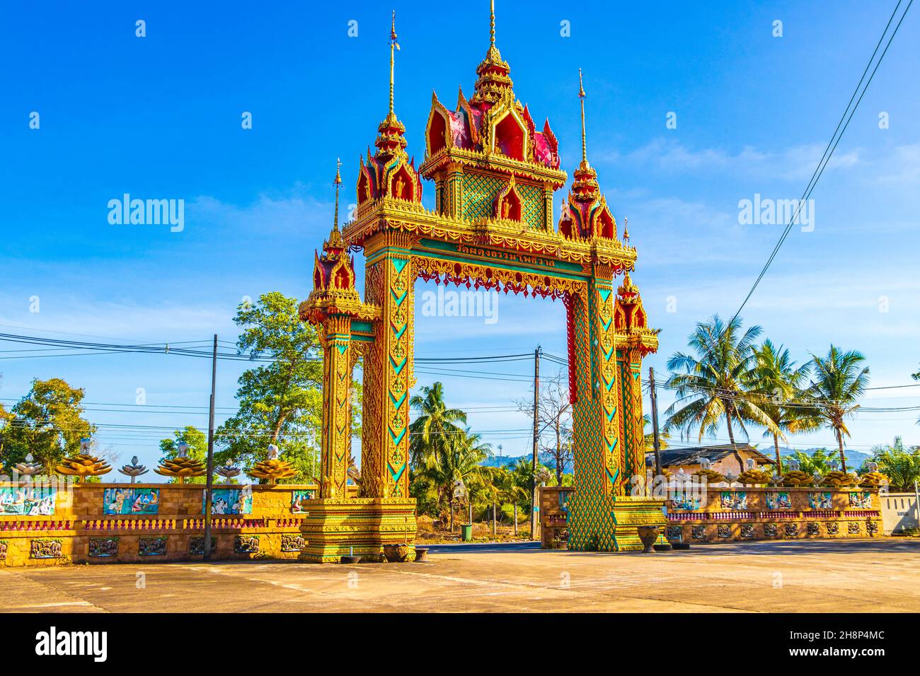 Beautiful colorful golden entrance gate in Wat Phadung Tham Phothi ...