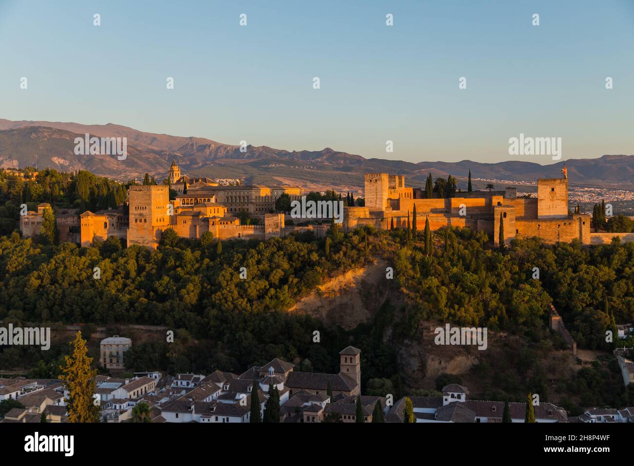 View of Alhambra Palace in Granada, Spain, with Sierra Nevada mountains ...