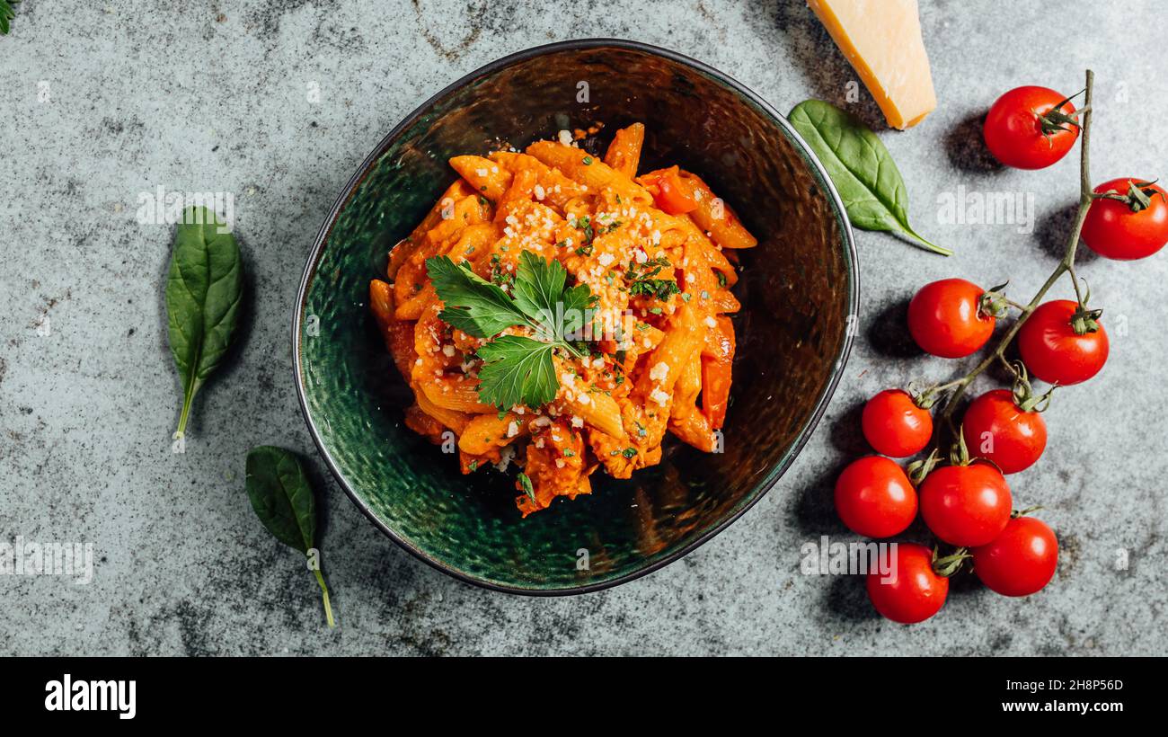 Top view of pasta, cheese and vegetables on a granite table Stock Photo ...