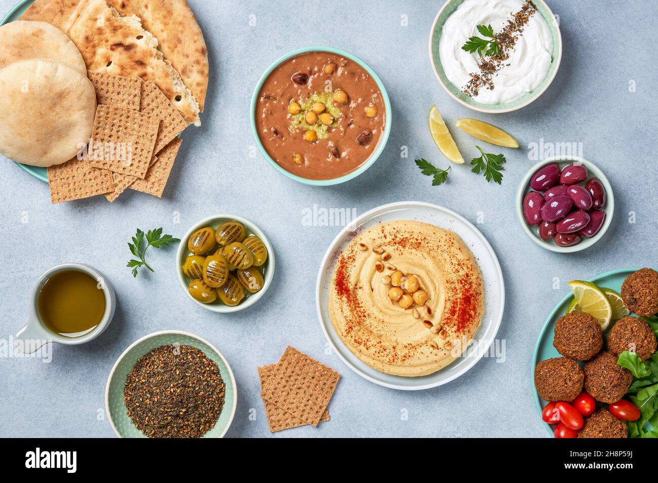 Middle eastern, arabic traditional breakfast with hummus, foul, falafel ...