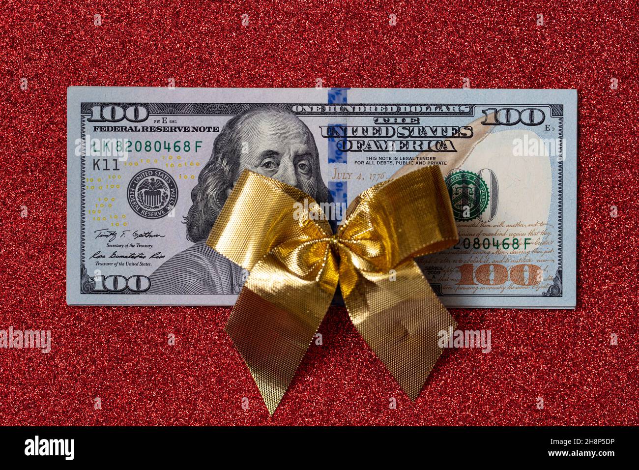 100 dollar banknotes with bow for design purpose Stock Photo - Alamy