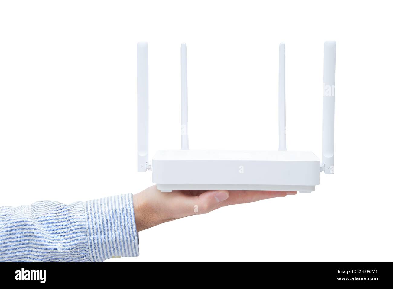 Crop view of a businessman's hand holding a modern dual band router ...