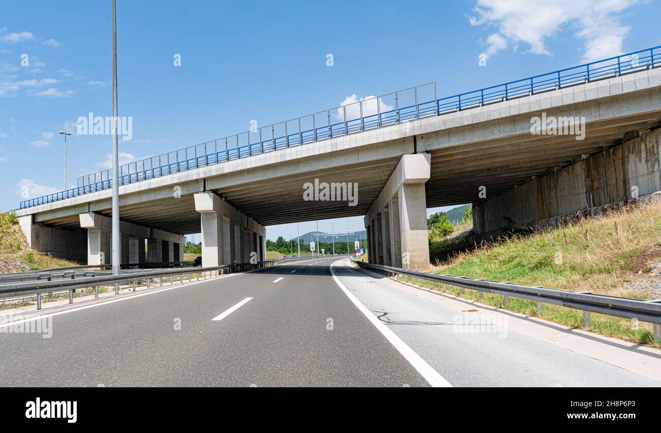 Highway bridge and cars on the road Stock Photo - Alamy